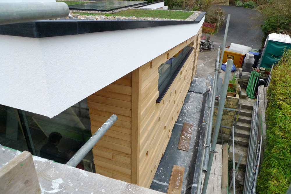 Modernist self-build - EWI & rainscreen cladding: Turboslug | Turbosnail